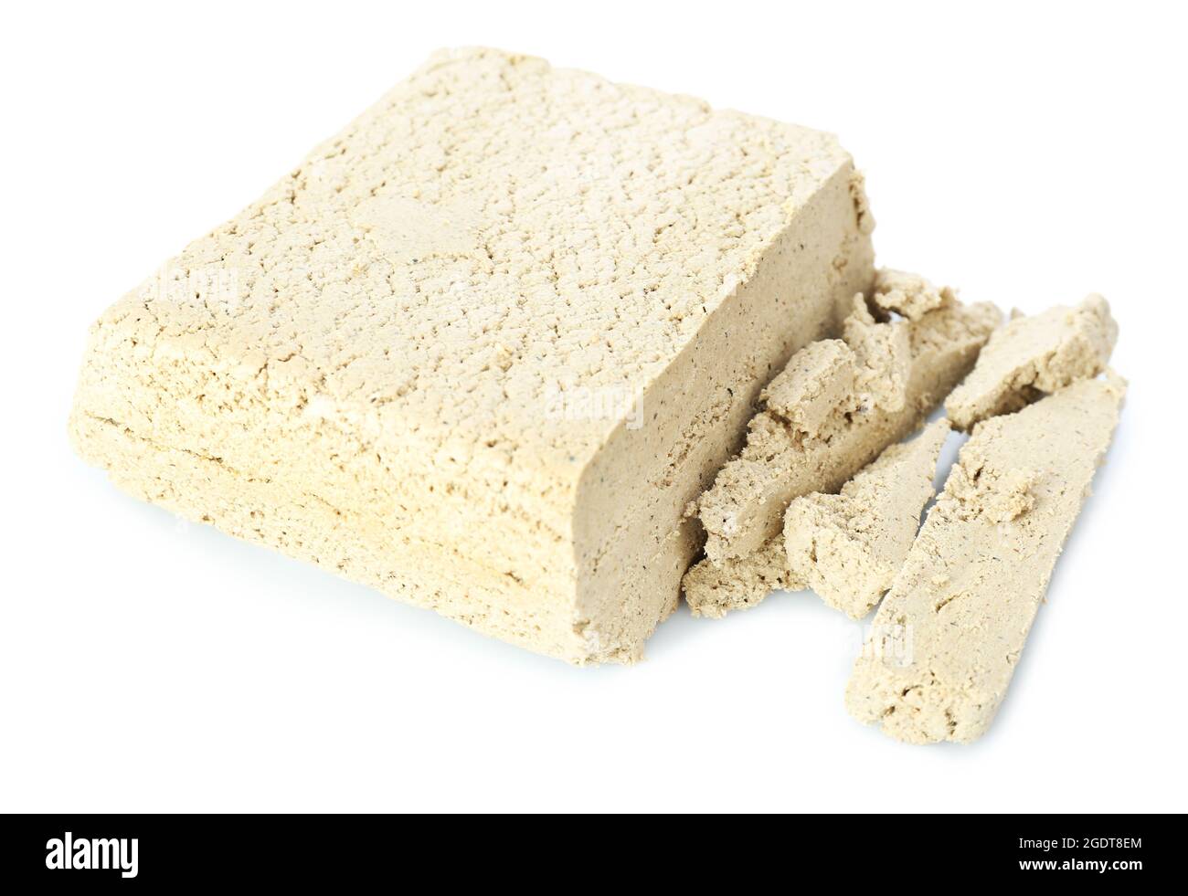 Sunflower halva isolated on white background Stock Photo - Alamy