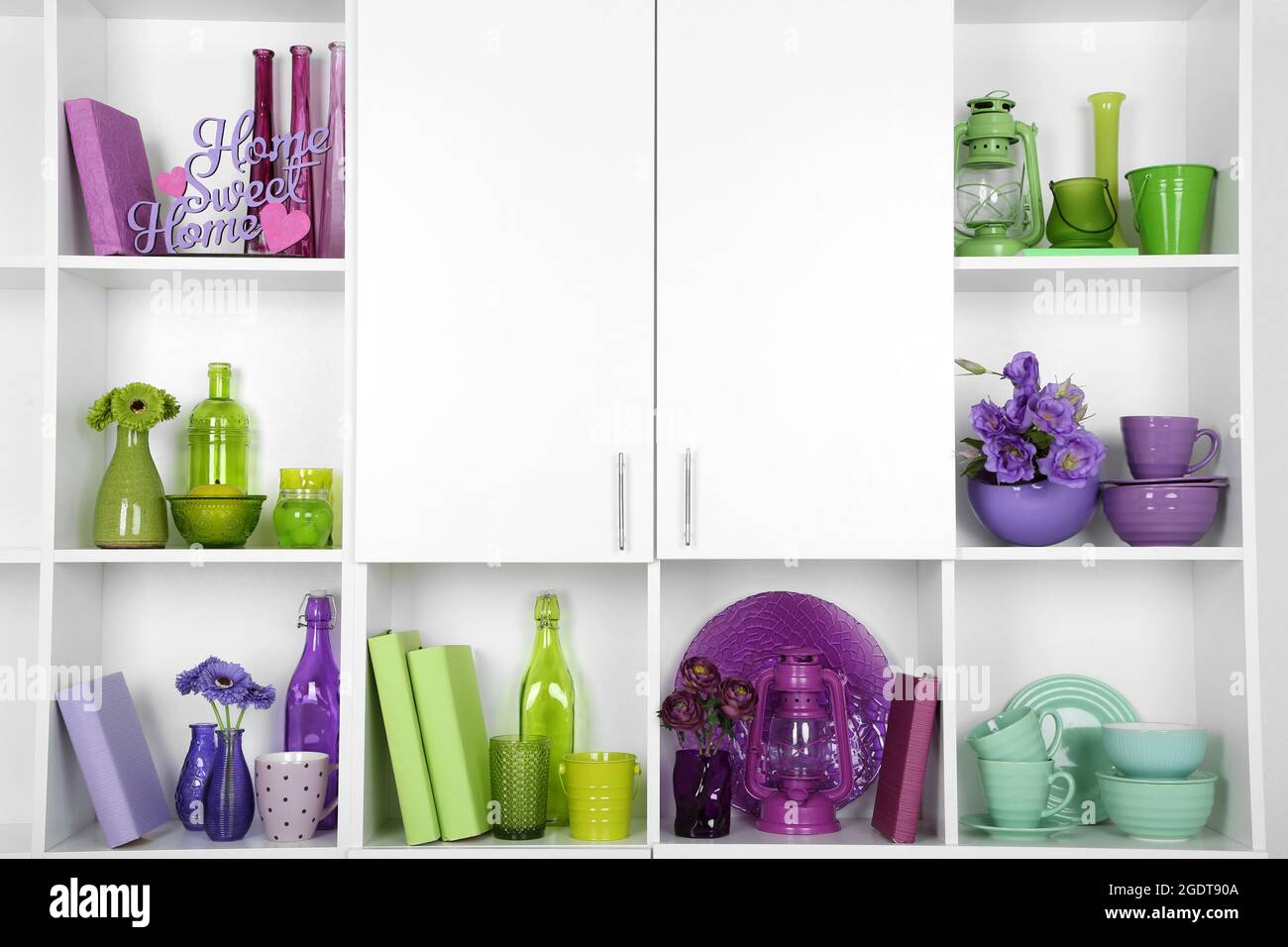 White shelves with colorful things, close-up Stock Photo - Alamy