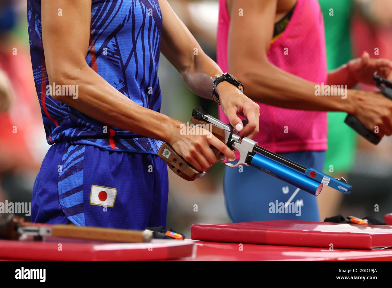 Tokyo, Japan. 5th Aug, 2021. Detail shot of gun on firing range Modern ...