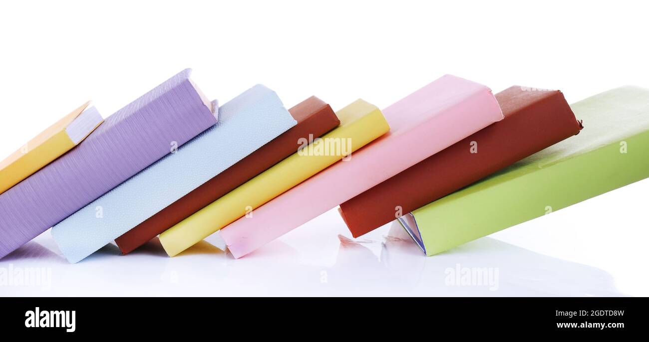 Falling books isolated on white Stock Photo - Alamy