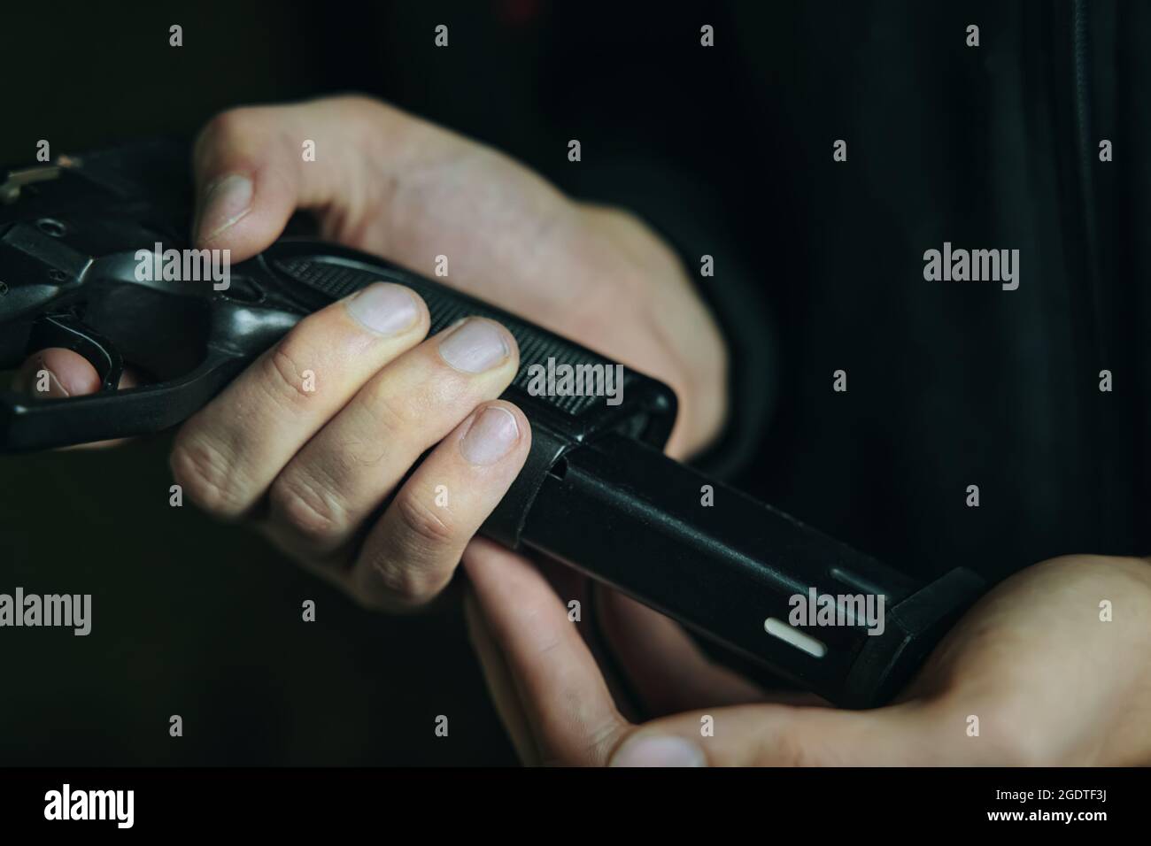 Reloading weapon hi-res stock photography and images - Alamy