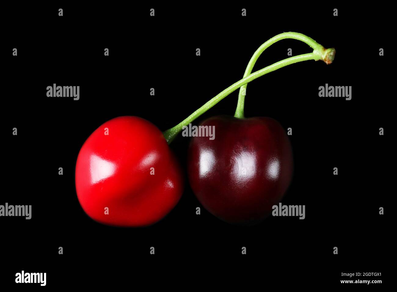 Cherry on black background Stock Photo - Alamy