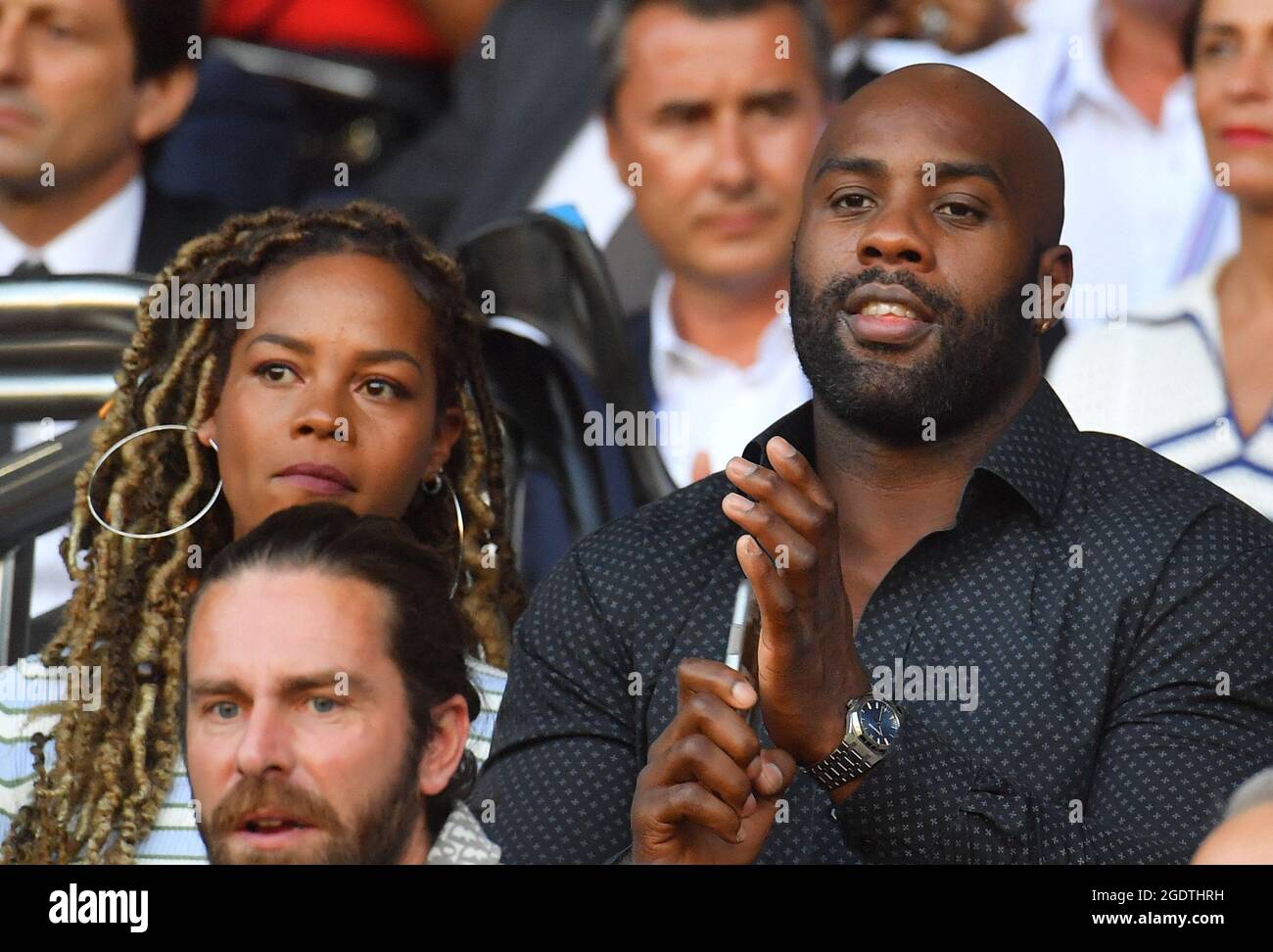 Teddy Riner and his wife Luthna Plocus attend he French L1 football ...