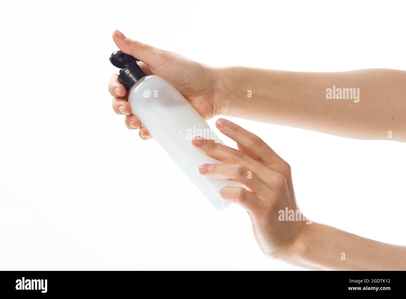 lotion in female hands moisturizing and skin care health Stock Photo ...