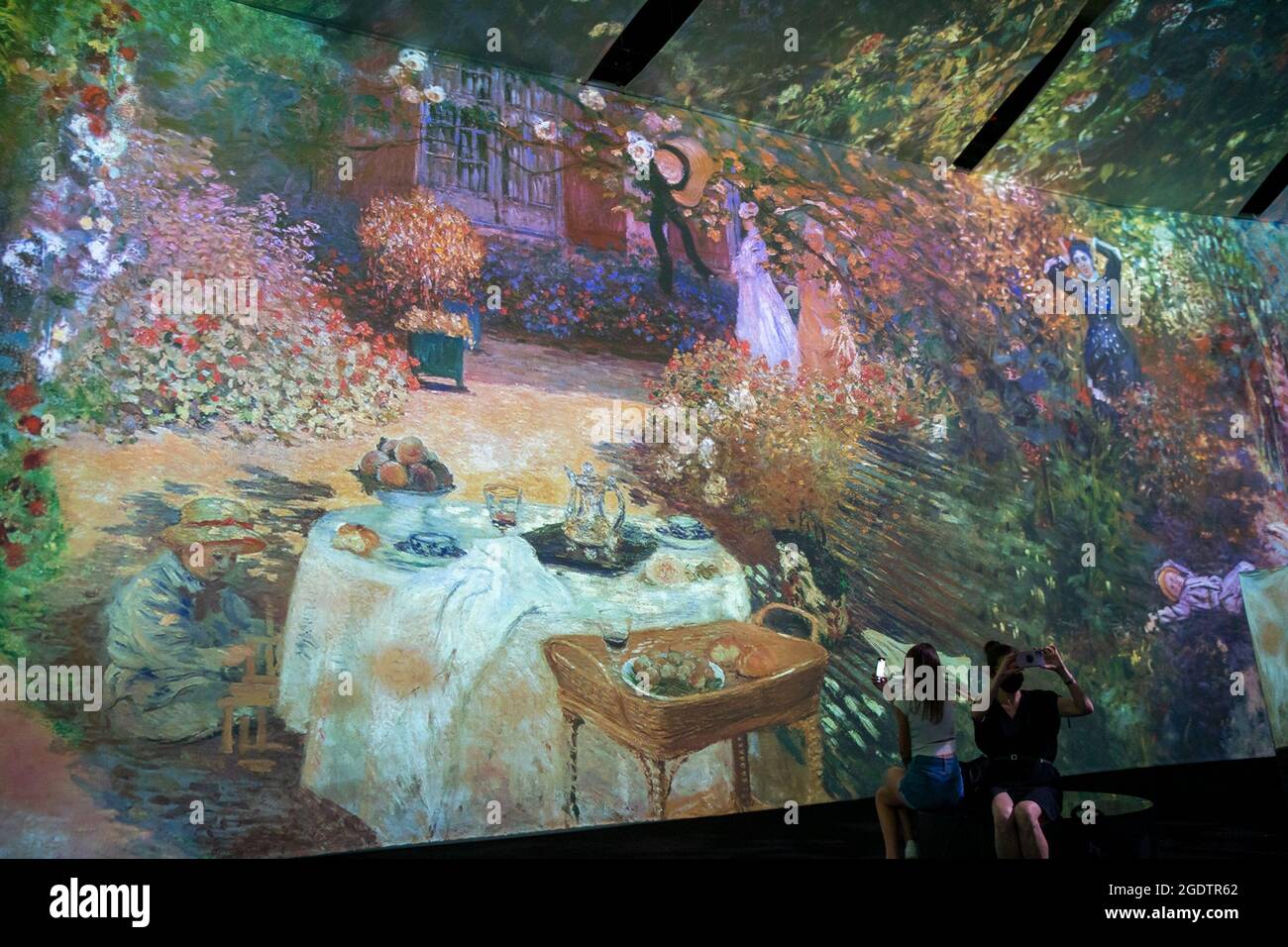 People attending the Beyond Monet exhibit at Metro Convention Centre ...