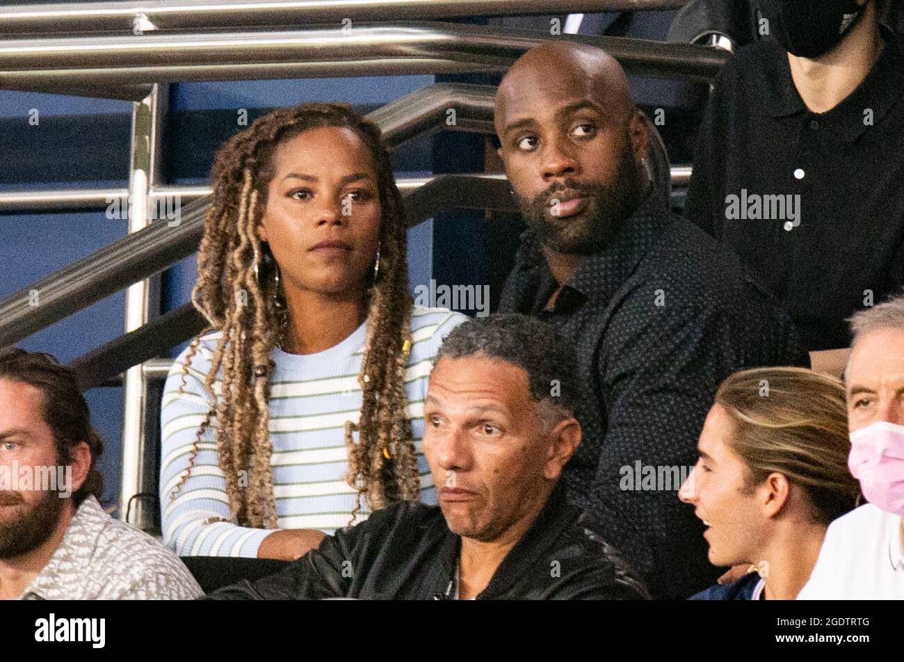 Teddy Riner and his wife Luthna Plocus attend the French Ligue 1 Uber ...