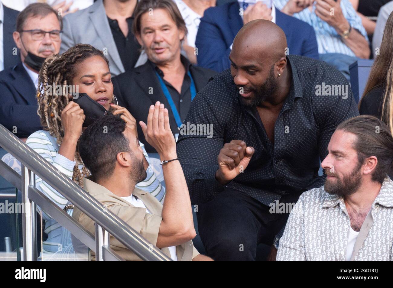 Teddy Riner and his wife Luthna Plocus attend the French Ligue 1 Uber ...