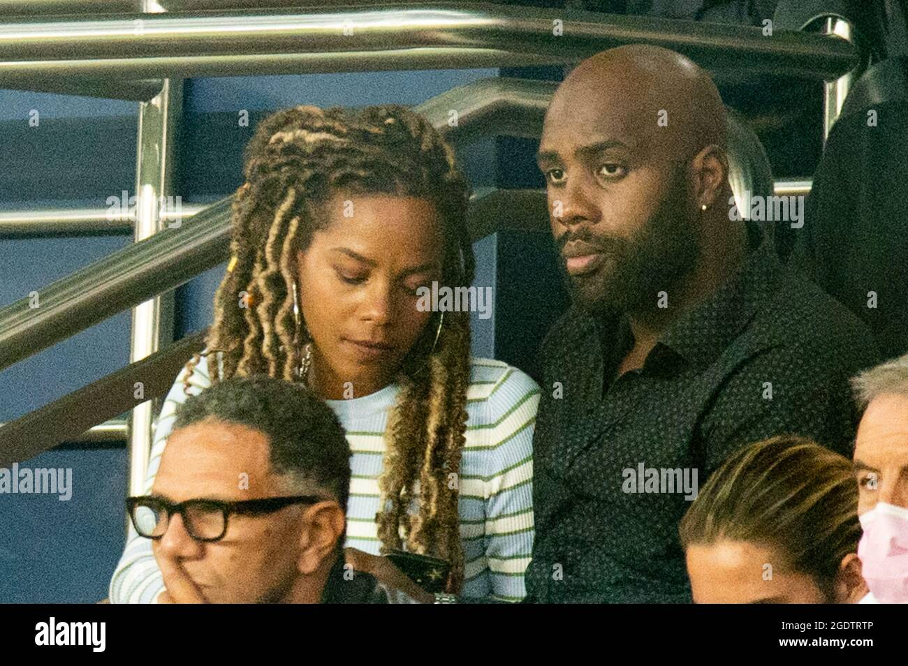 Teddy Riner and his wife Luthna Plocus attend the French Ligue 1 Uber ...