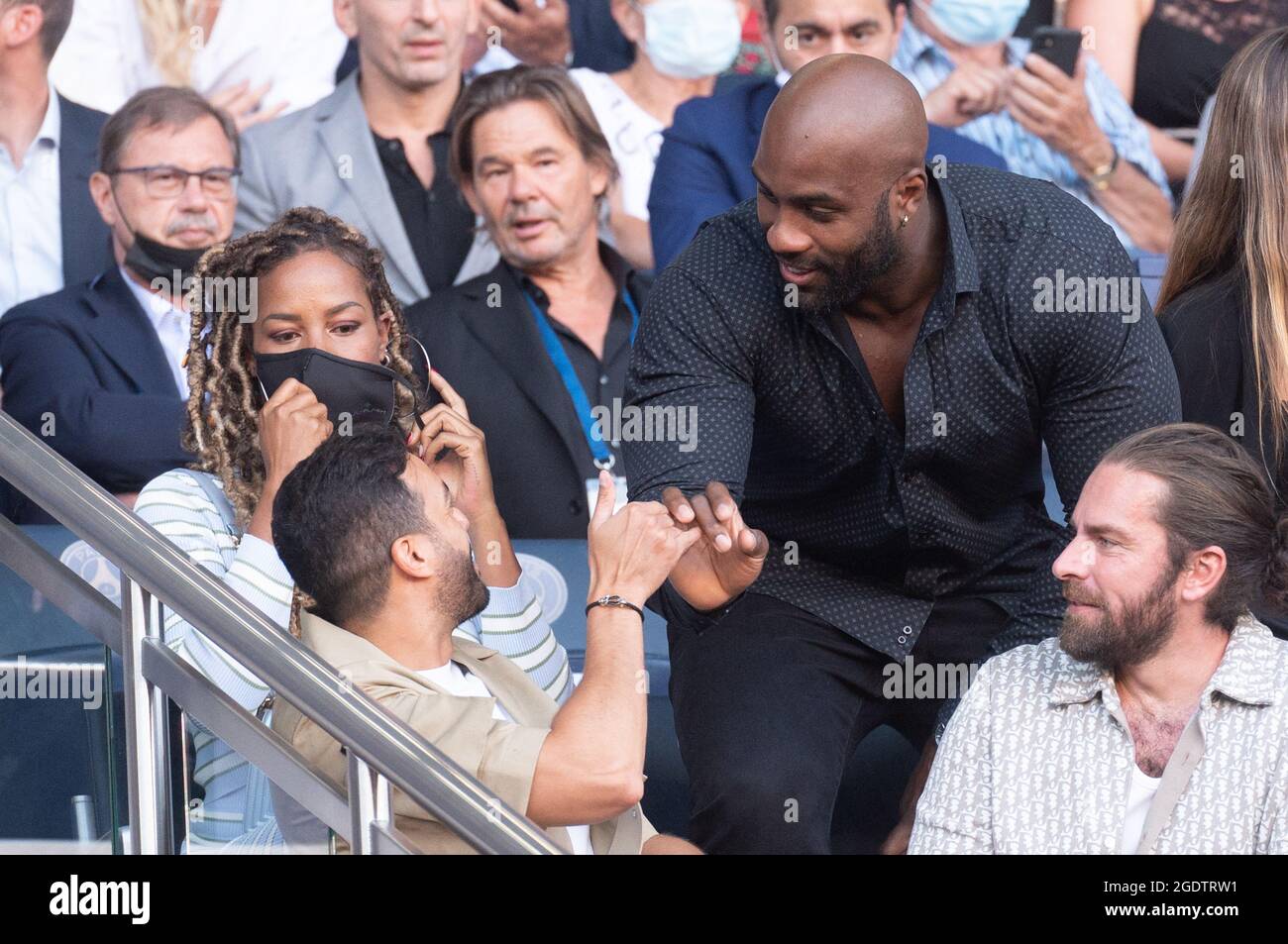 Teddy Riner and his wife Luthna Plocus attend the French Ligue 1 Uber ...
