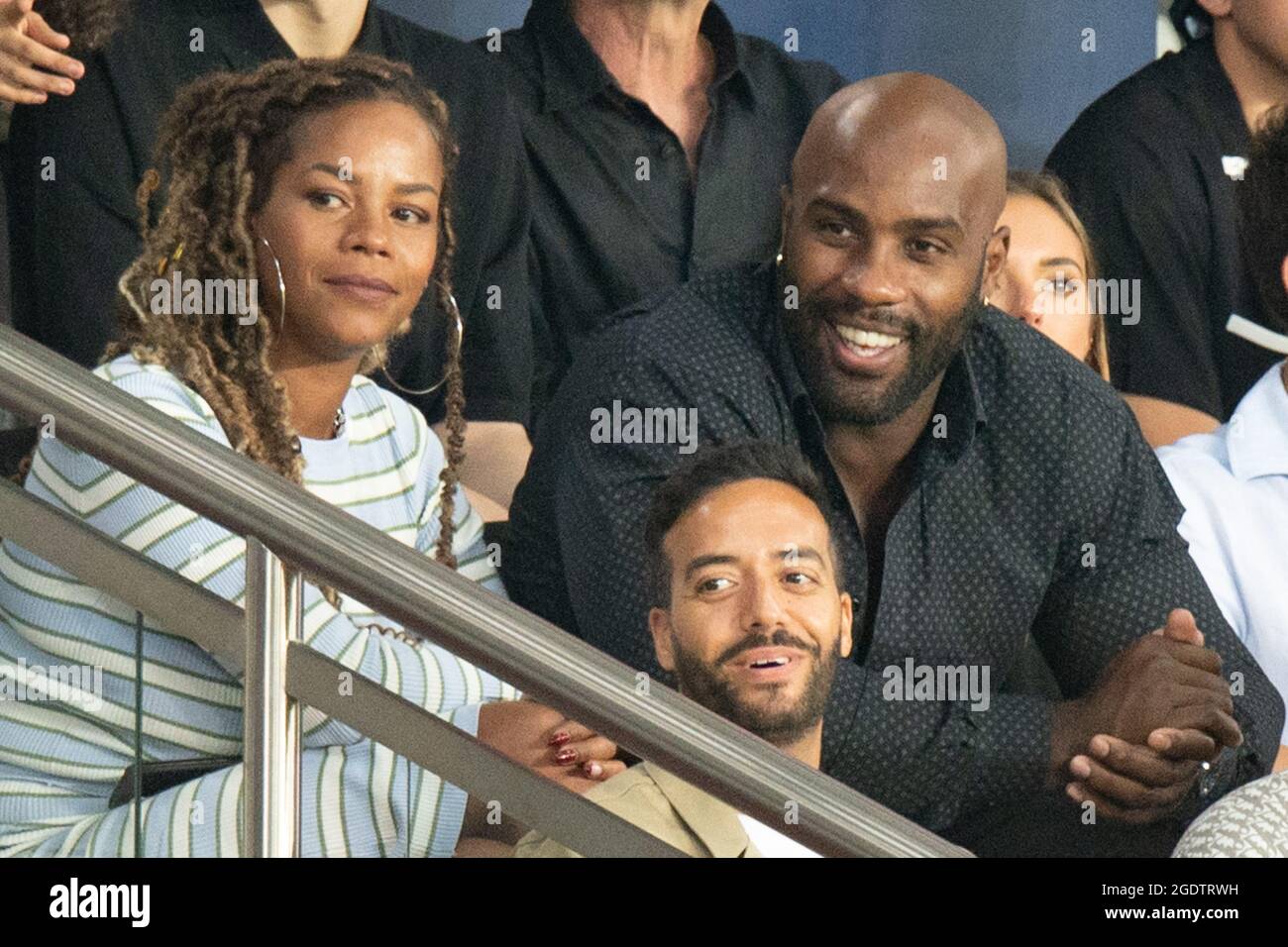 Teddy Riner and his wife Luthna Plocus attend the French Ligue 1 Uber ...
