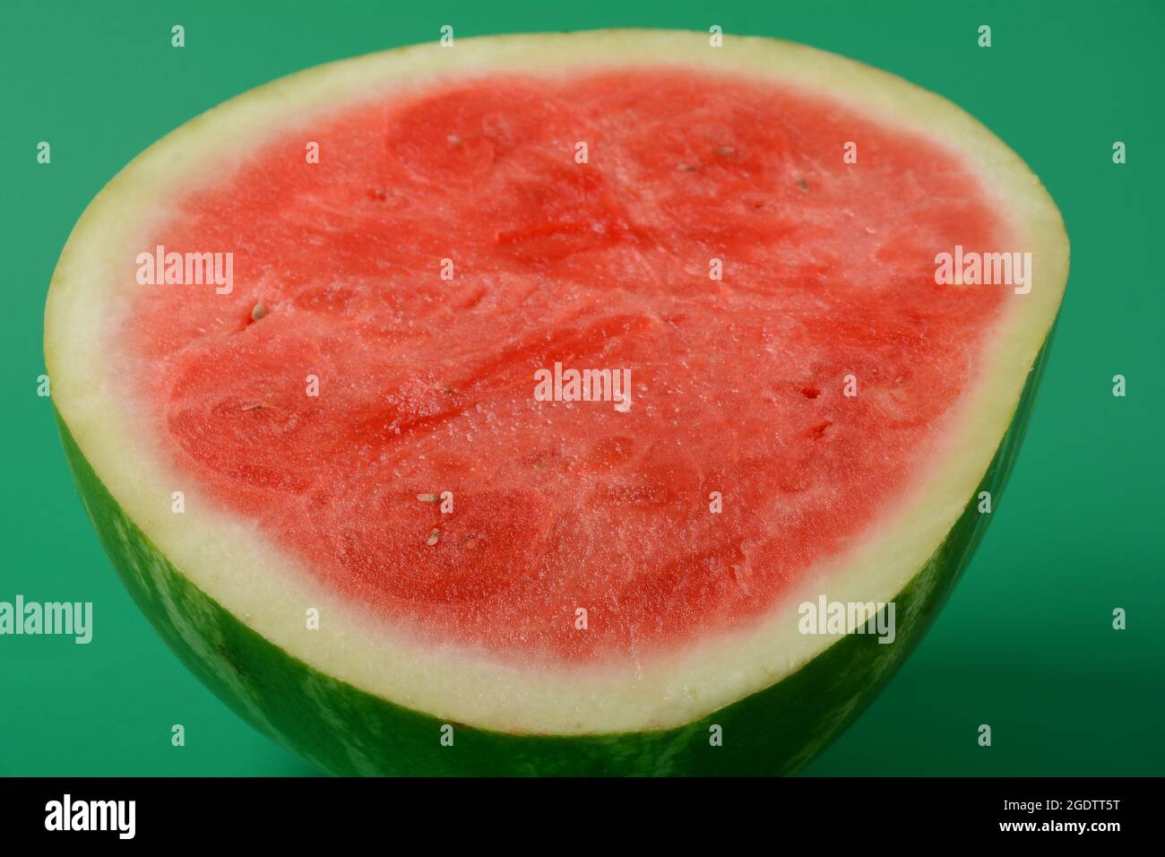 A half of fresh watermelon on bright background Stock Photo - Alamy