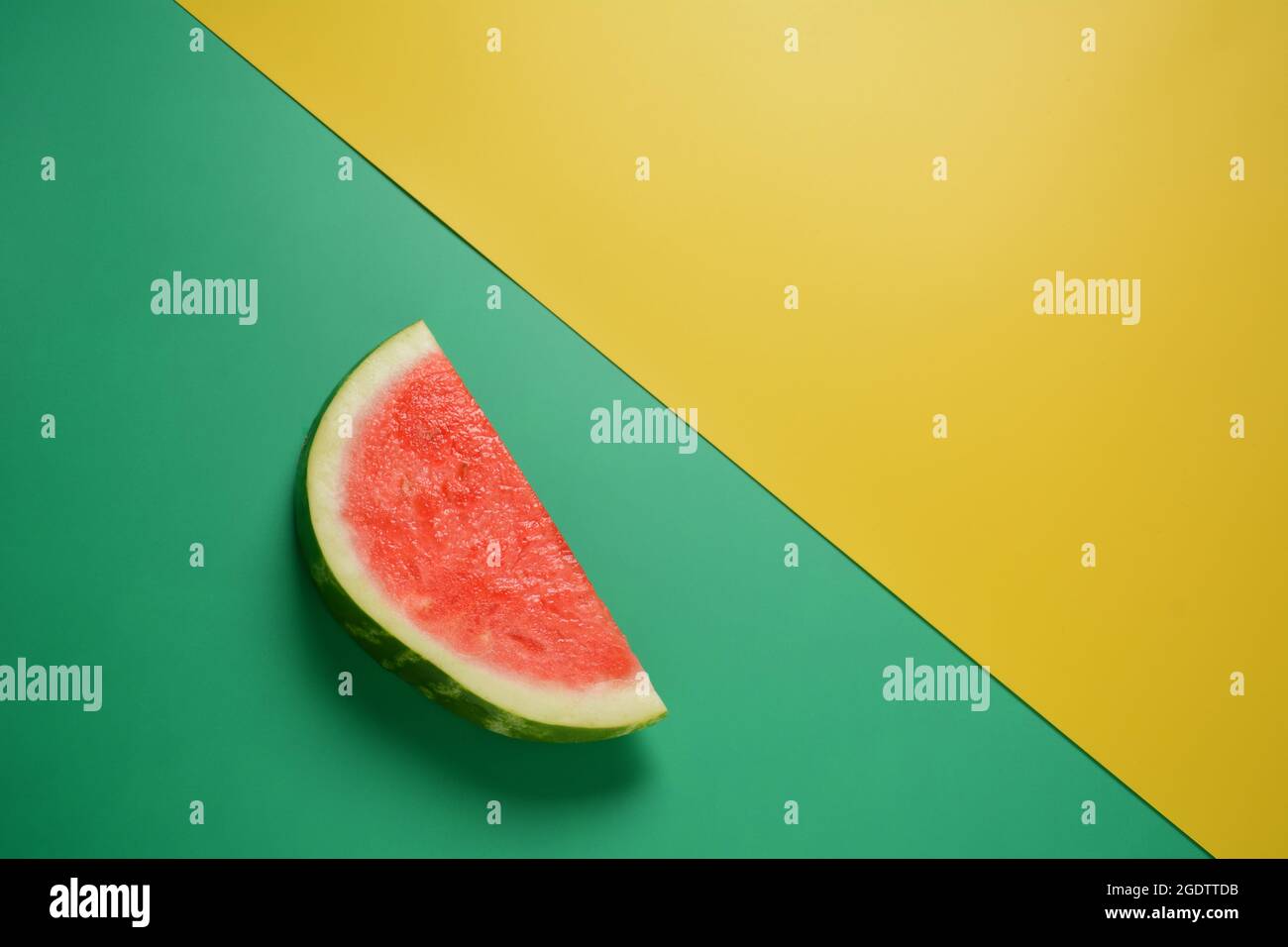 Fresh sliced watermelon piece on bright background Stock Photo - Alamy