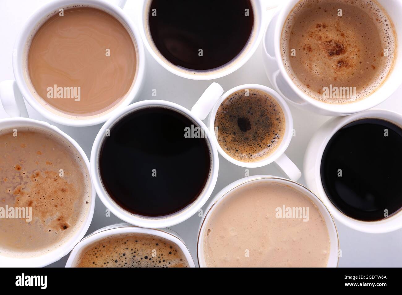 Lots of coffee cups on white background Stock Photo - Alamy