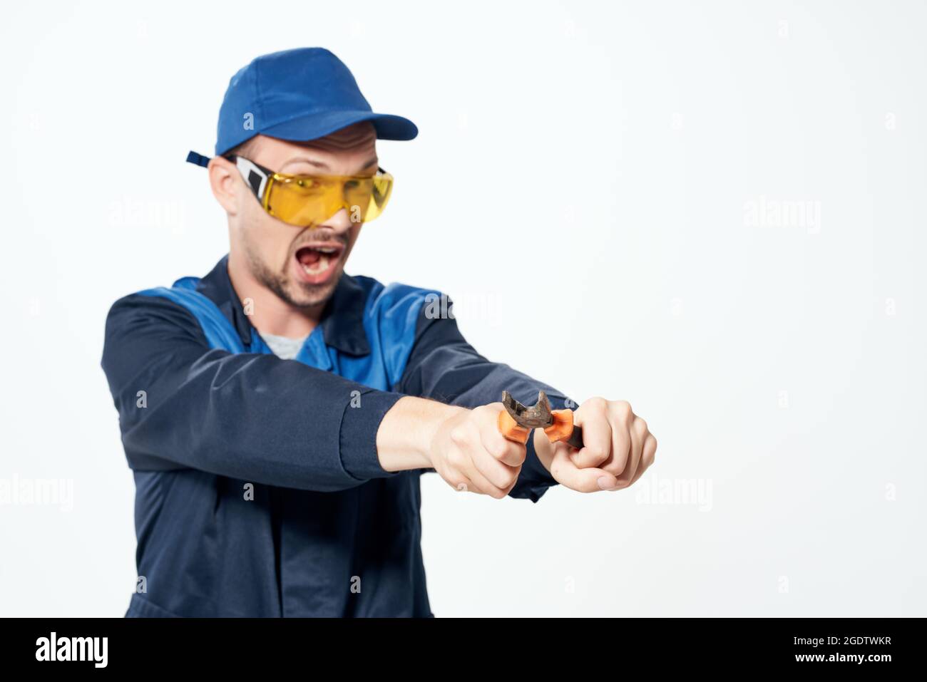 man in working uniform repair painting decorator Stock Photo - Alamy