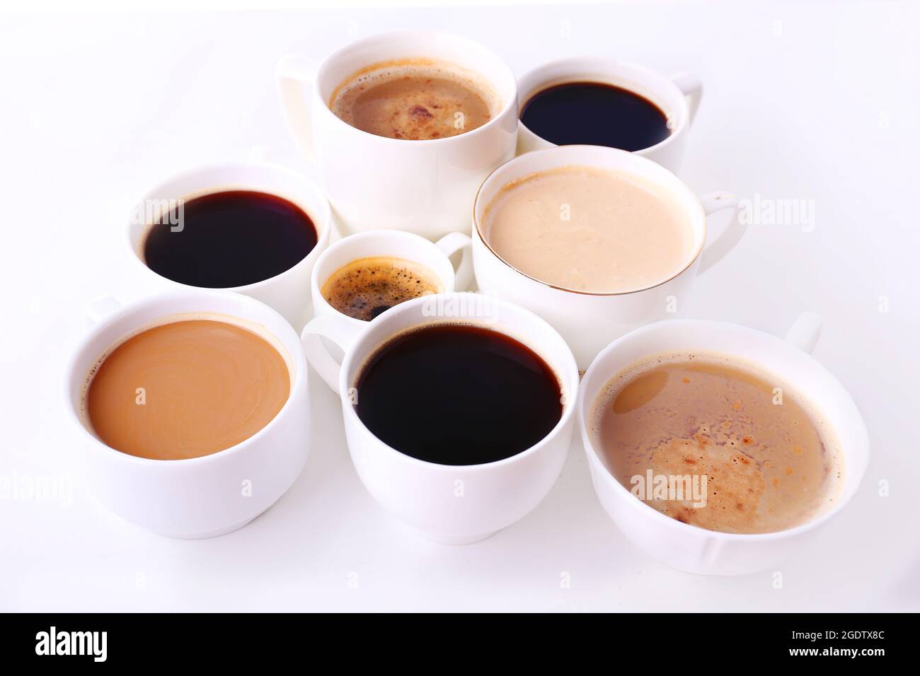 Lots of coffee cups on white background Stock Photo - Alamy