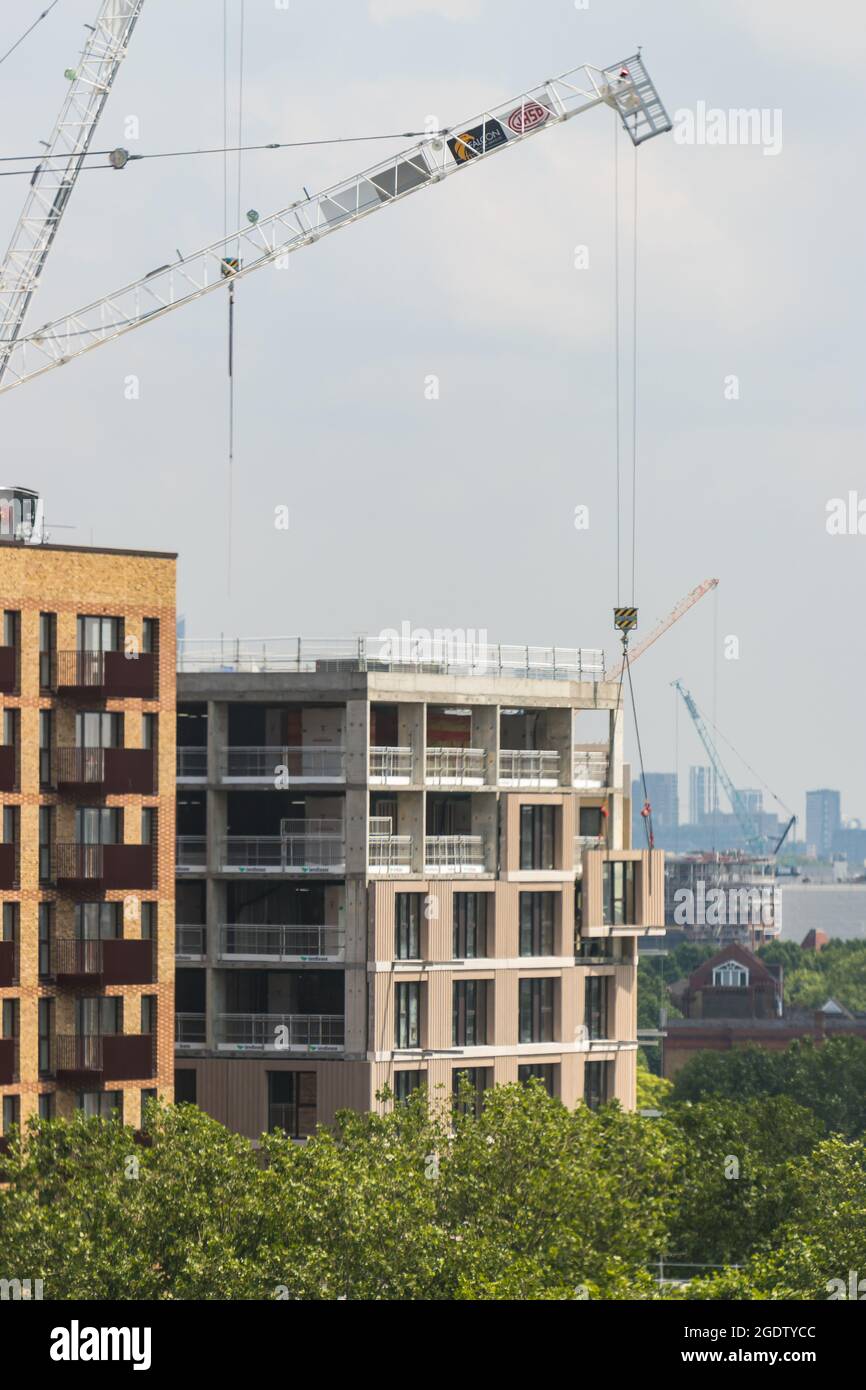 Modular element being hoisted to a new building Stock Photo - Alamy