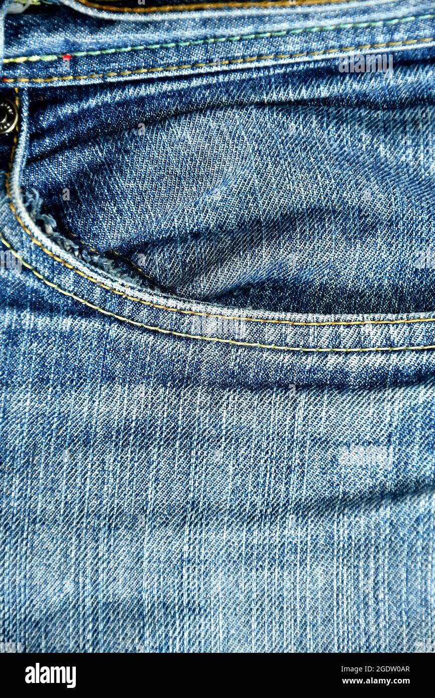 old used jeans, front with bag Stock Photo - Alamy