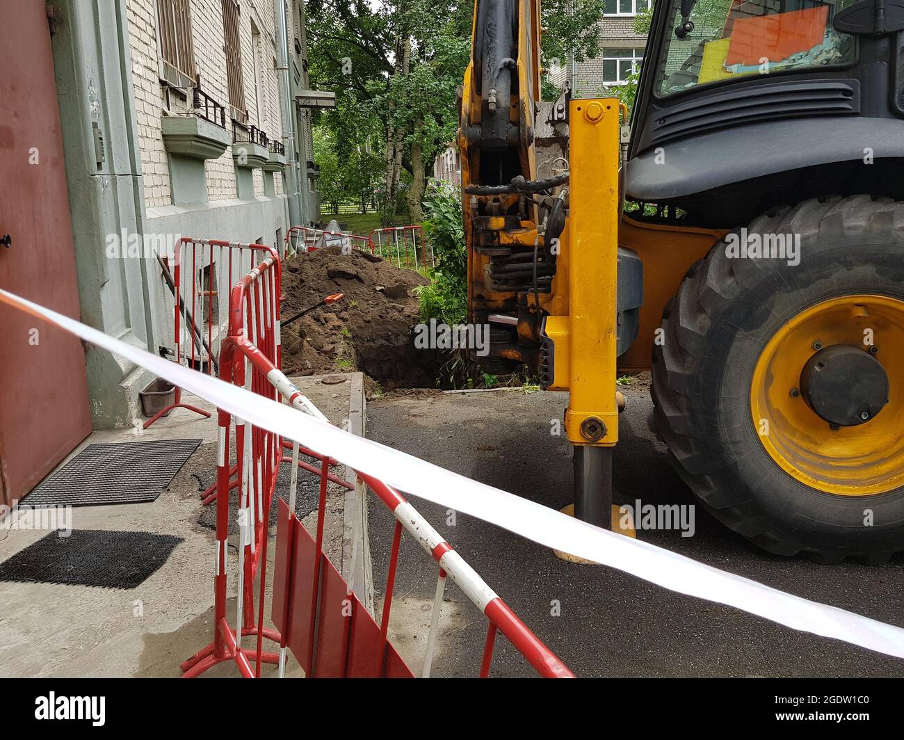 Bucket digger digging trench, construction concept Stock Photo - Alamy