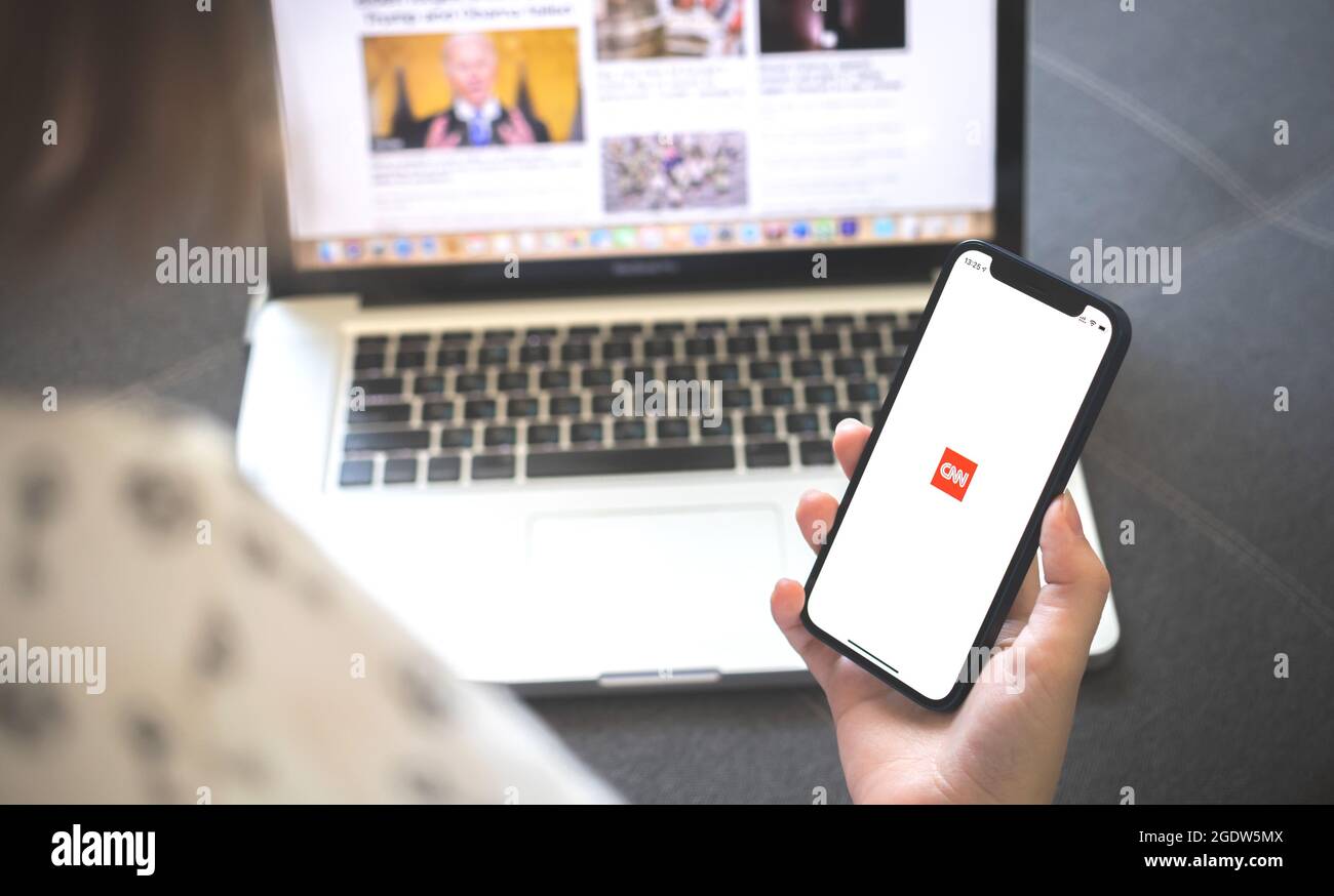 Kharkov, Ukraine - August 12, 2021: Cnn news app. Woman using ...