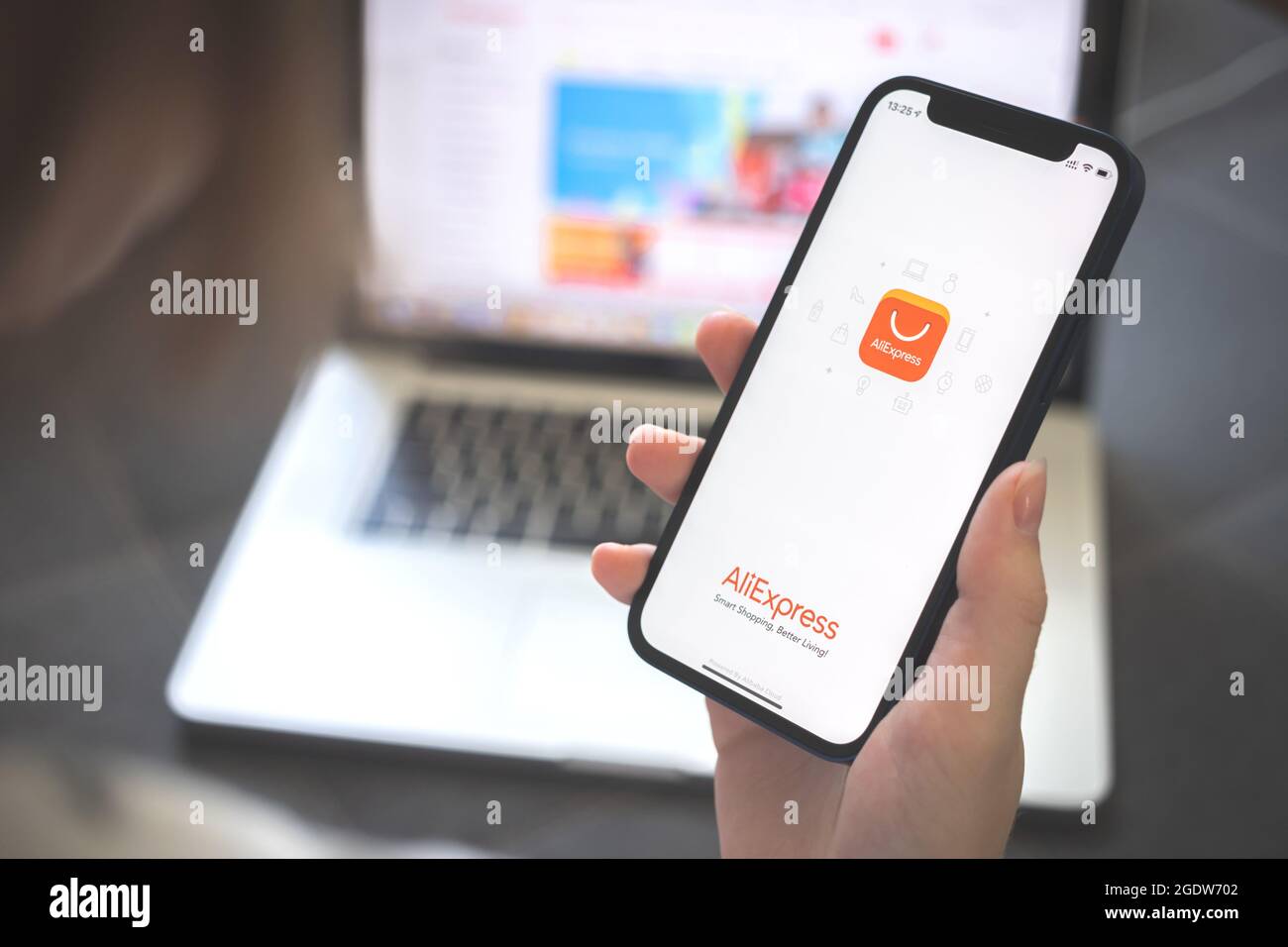 Kharkov, Ukraine - August 12, 2021: Aliexpress app. Woman using ...