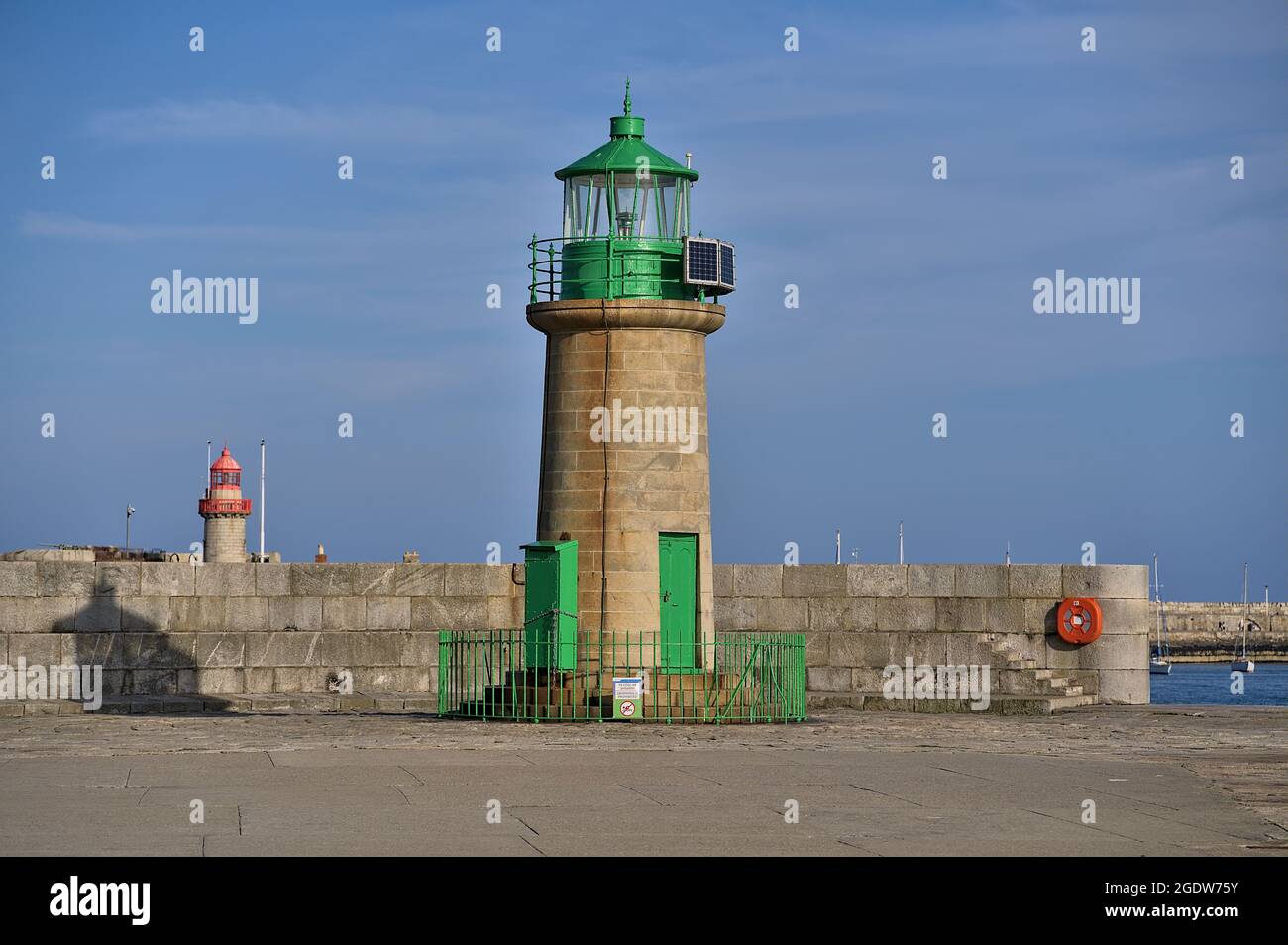 Beautiful evening view of red and green East and West Pier lighthouses ...