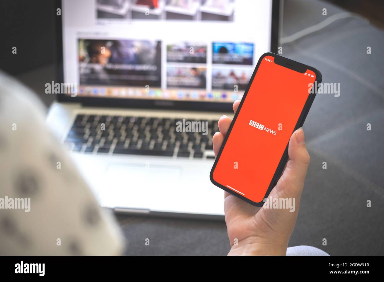 Kharkov, Ukraine - August 12, 2021: BBC news app. Woman using ...