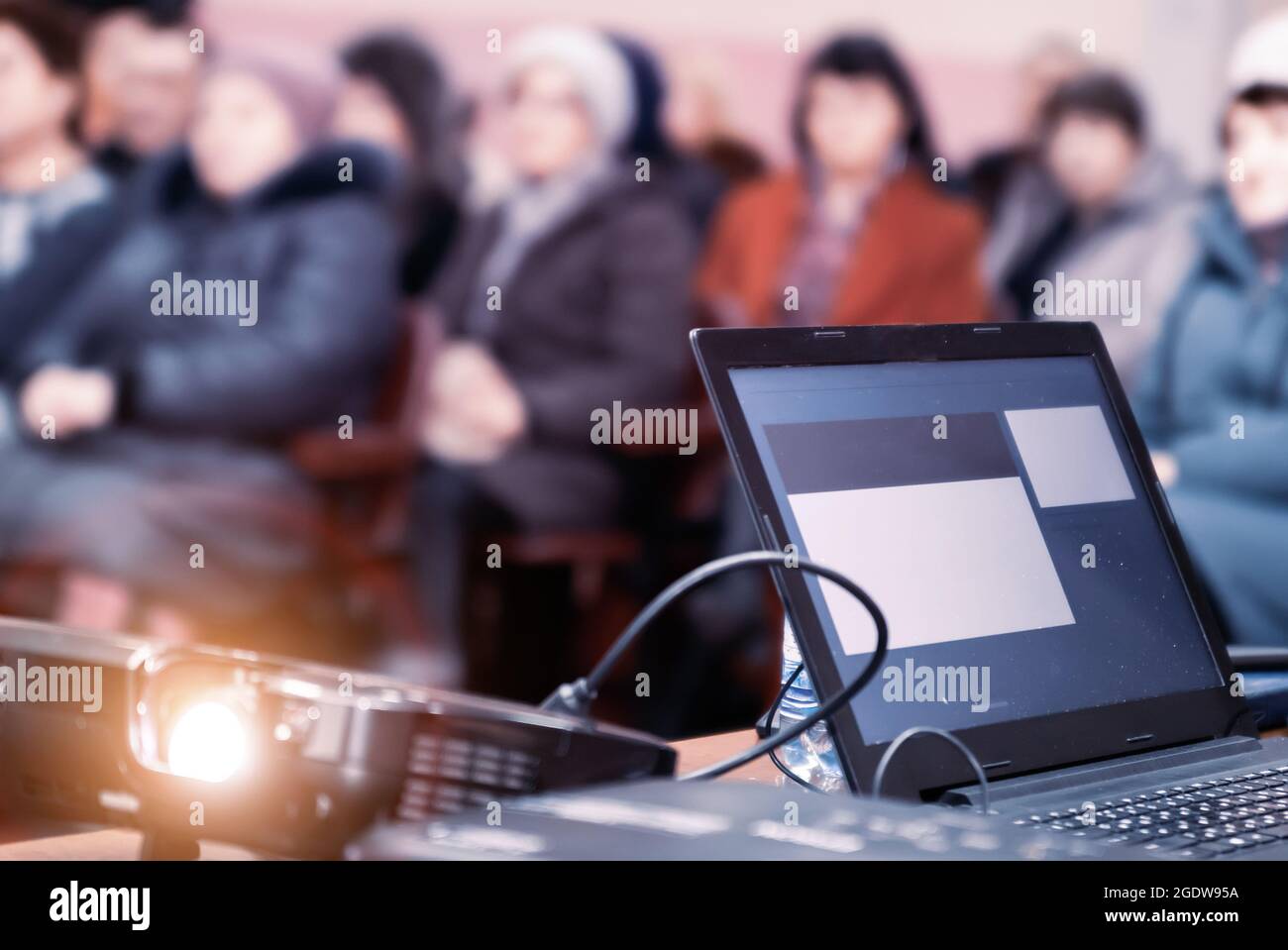 Laptop and projector for presentation Stock Photo - Alamy