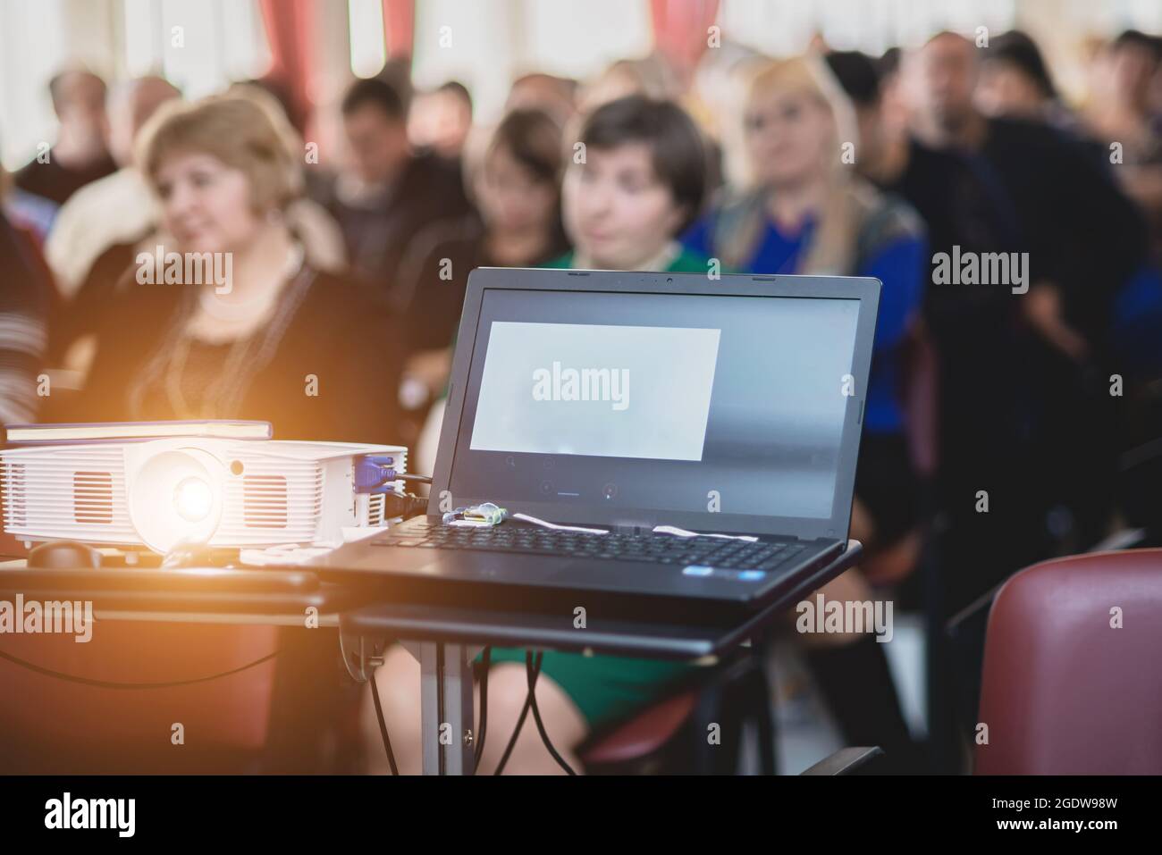 Laptop and projector for presentation Stock Photo - Alamy