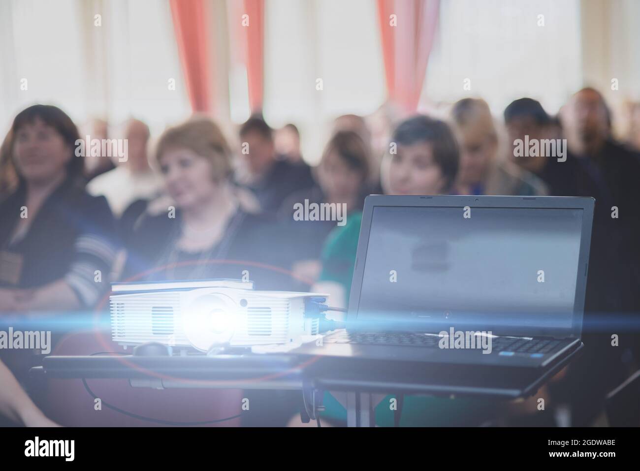 Laptop and projector for presentation Stock Photo - Alamy