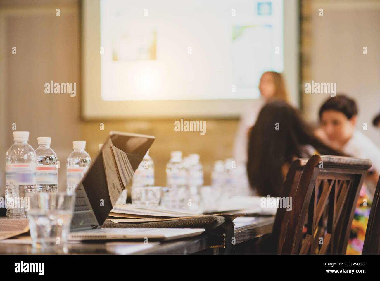 Open laptop screen on a table in a business center Stock Photo - Alamy