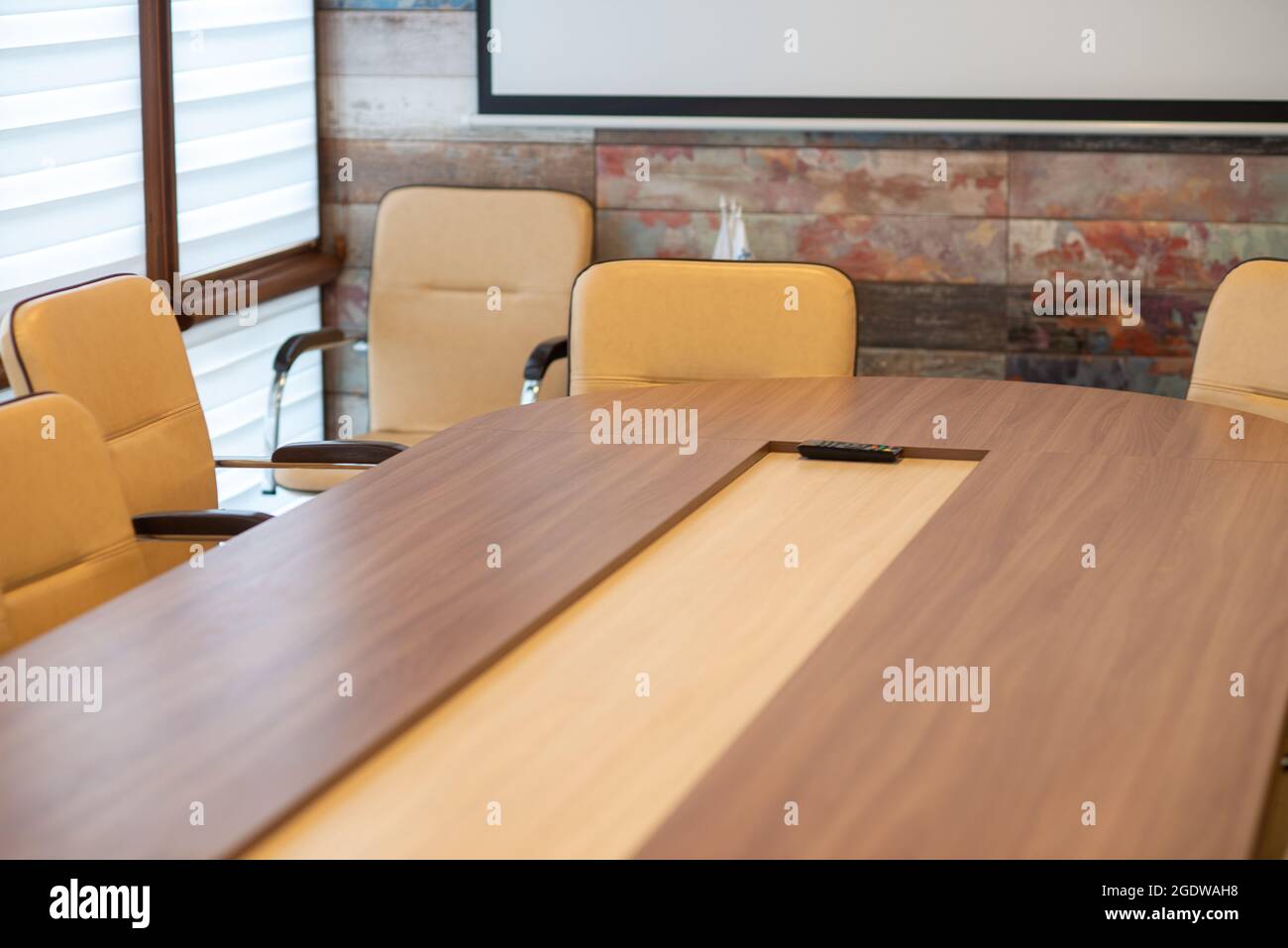 Edge of the table in the meeting room Stock Photo - Alamy