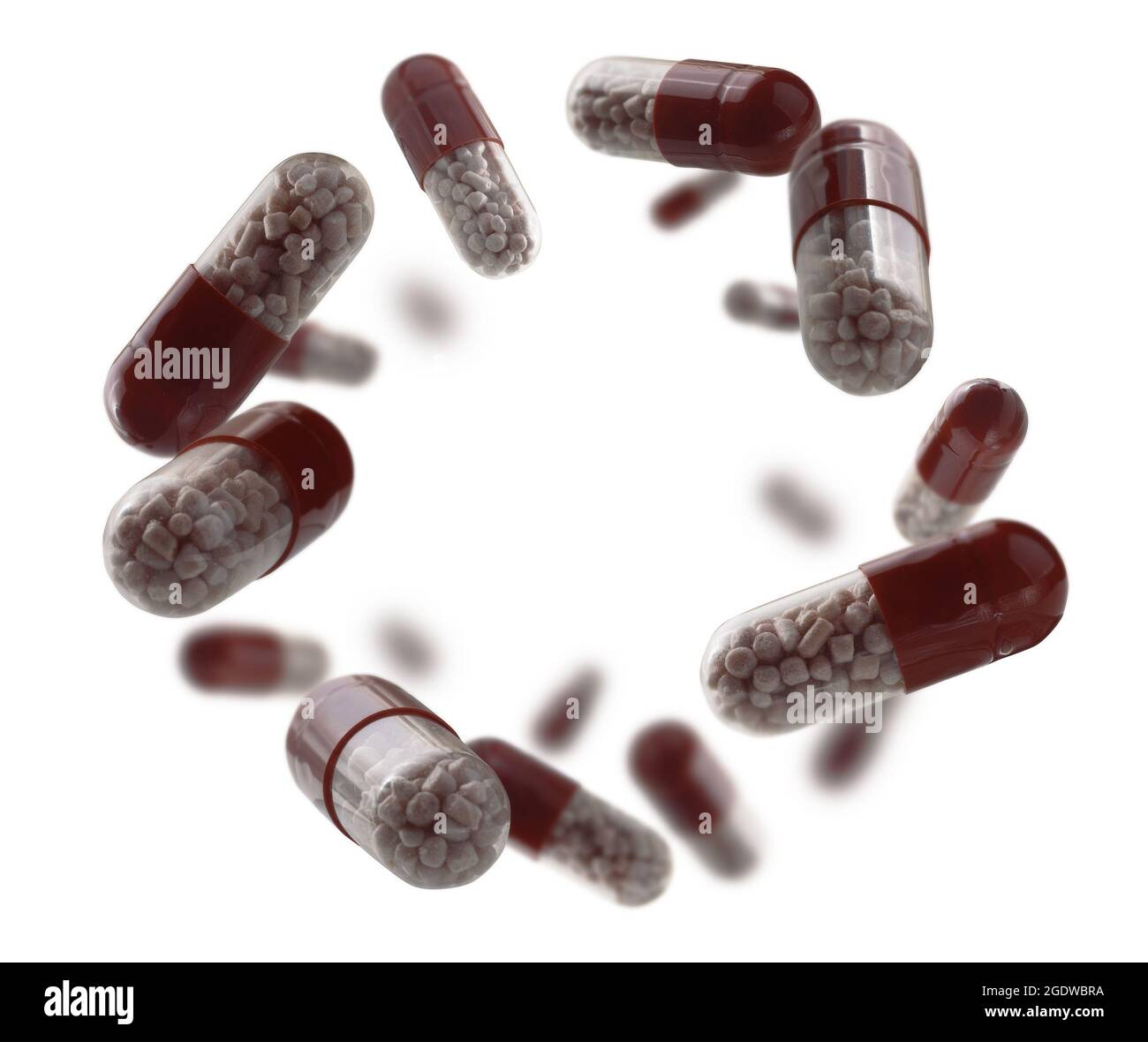 Capsules with the drug levitate on a white background Stock Photo - Alamy