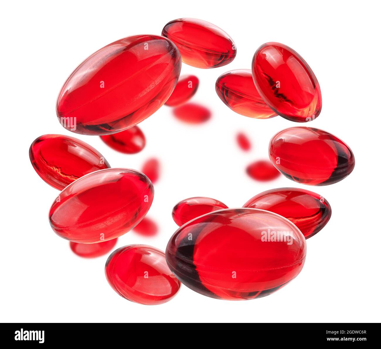 Red capsules levitate on a white background Stock Photo - Alamy