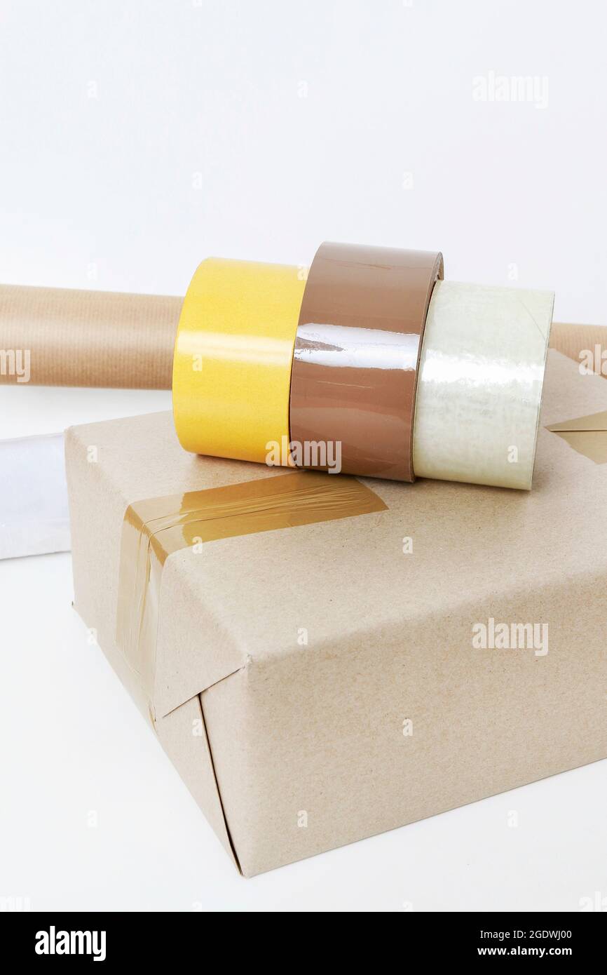 Parcel wrapped with brown paper isolated on white background Stock ...
