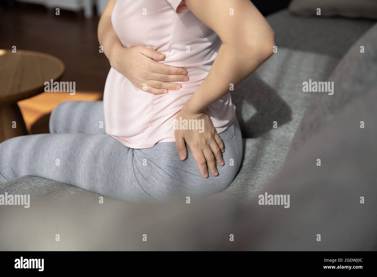 Woman backache child hi-res stock photography and images - Alamy