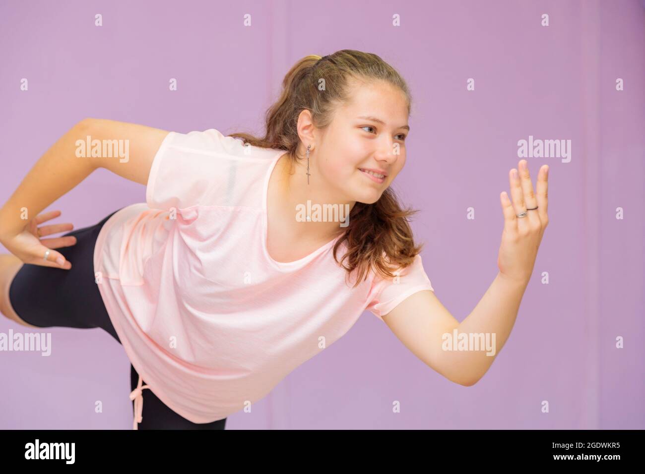 In training, the girl performs the elements of the dance. A dance ...