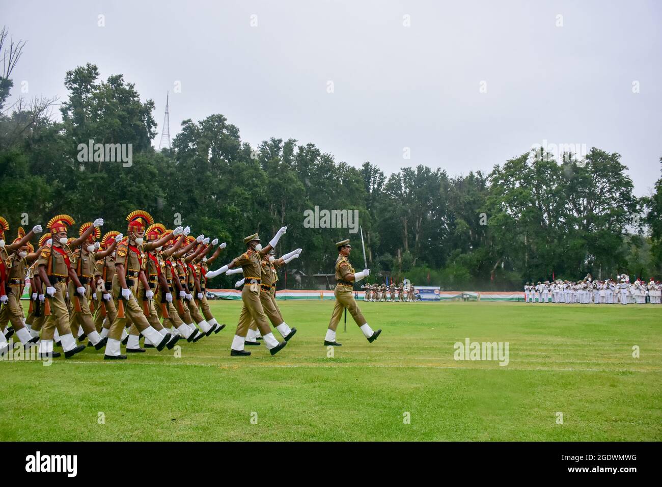 Srinagar, India. 15th Aug, 2021. A contingent of Indian policemen march ...