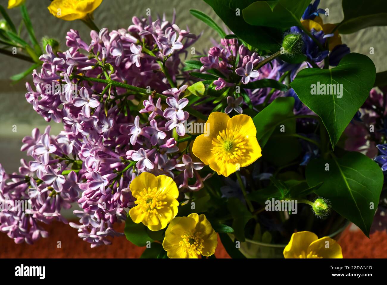 mixed bouquets of spring flowers, lilac, duckling and other spring ...