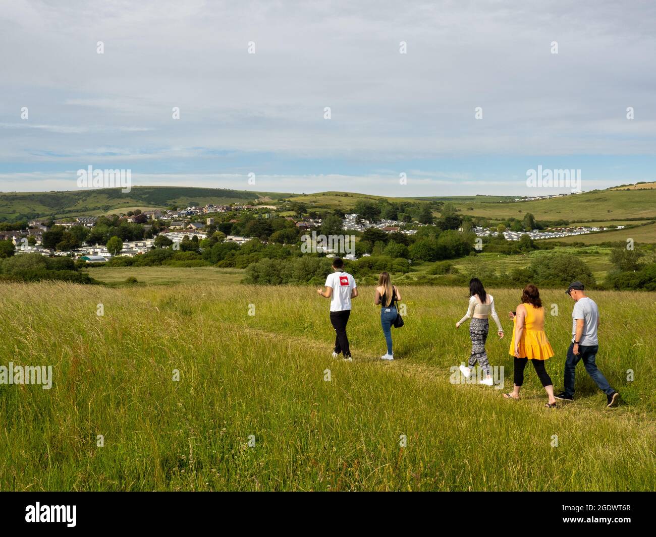 Visitors on the path from Weymouth beach to Seaview Haven holiday park ...