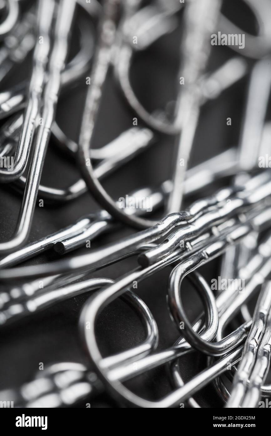 Paper clips scattered as textured background in full screen Stock Photo ...