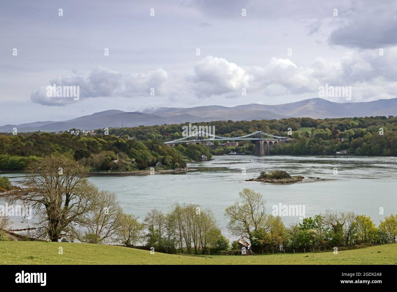 Menai suspension bridge joining Anglesey to mainland Wales Stock Photo ...
