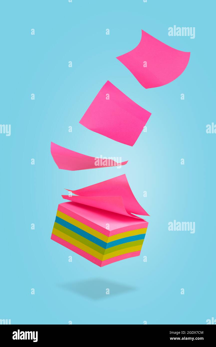 Creative idea made of notes and pieces of paper floating in the air ...