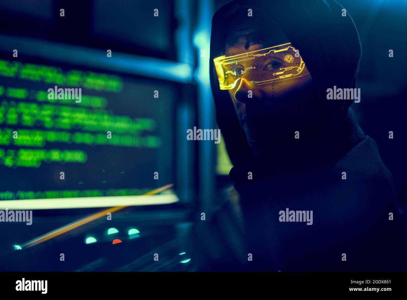 Cyber hacker breaks into databases to obtain information using a computer. Cybercrime and data ...