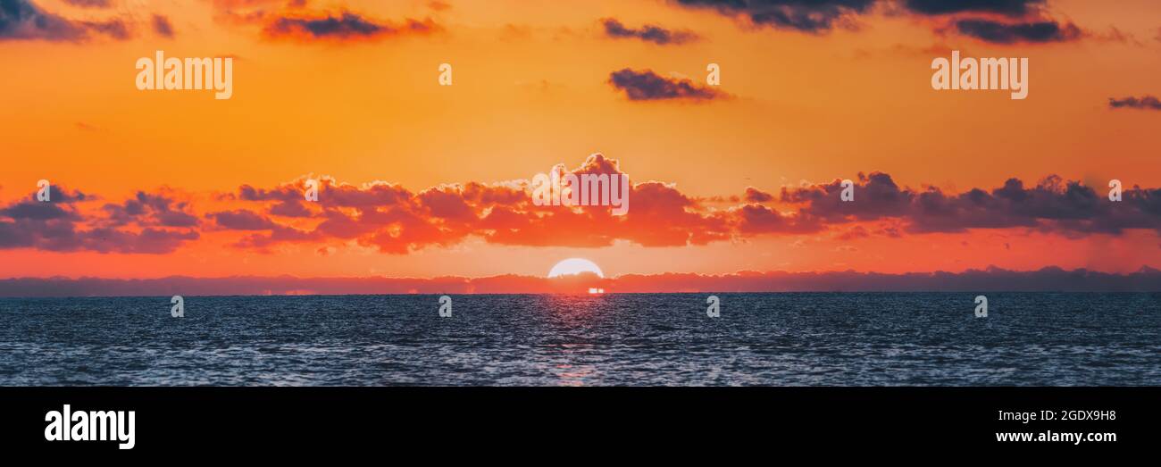 Panorama Of Sundown Over Sea Horizon At Sunset. Natural Sunrise Sky ...