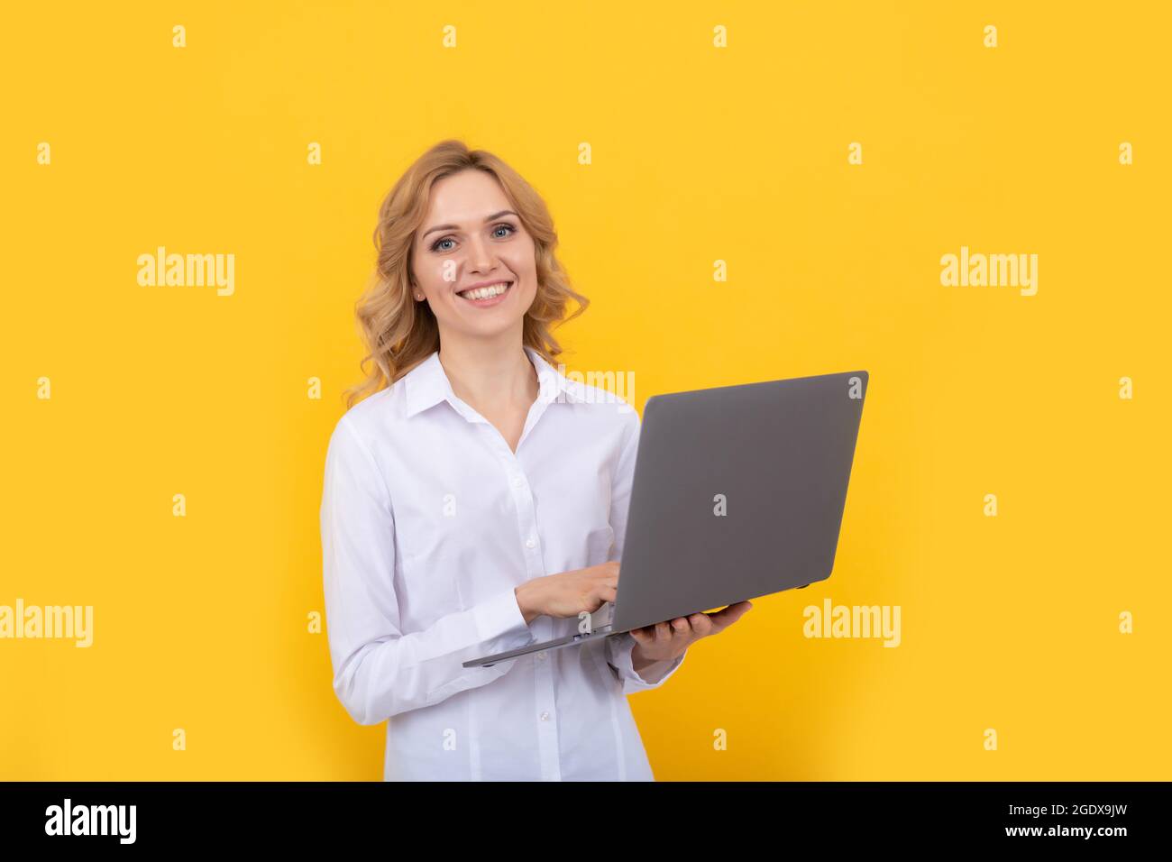 cheerful freelance woman post blog online. copy space. businesswoman ...