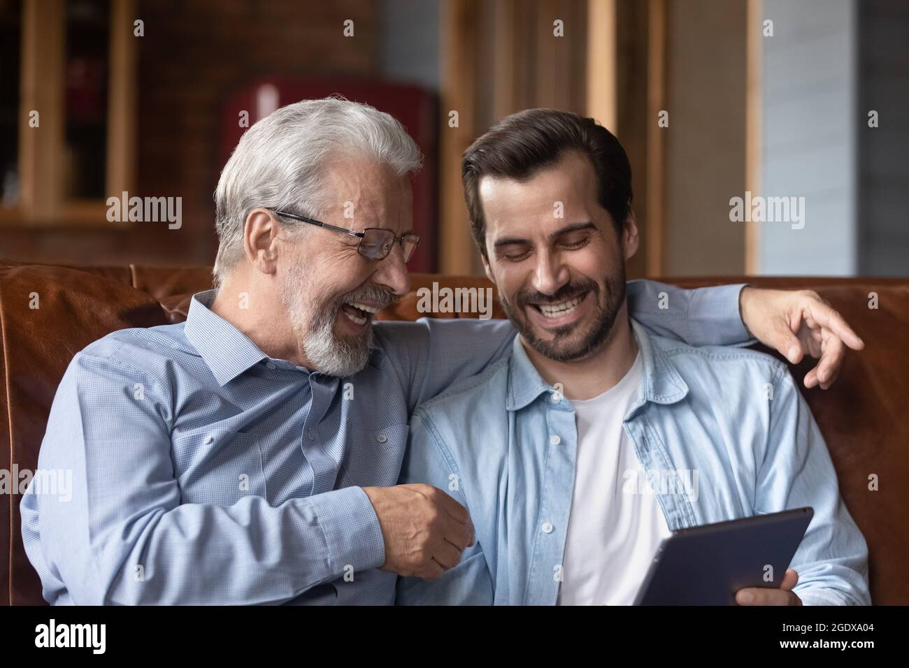 Elderly father and son tablet hi-res stock photography and images - Alamy