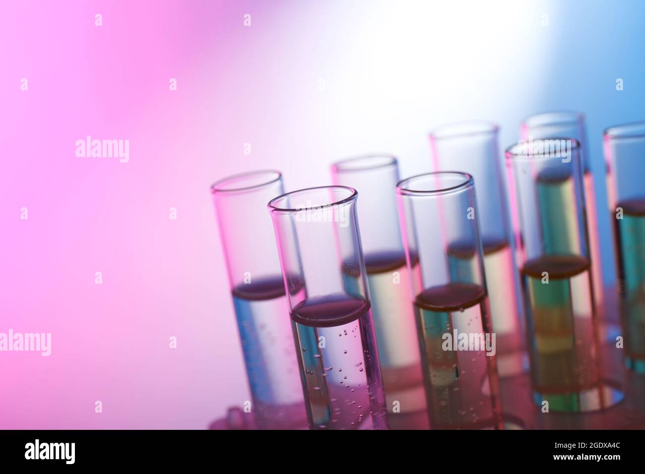 Test-tubes with water on the shining background Stock Photo - Alamy