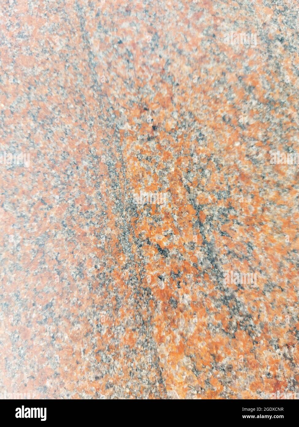 A vertical background of orange granite stone texture Stock Photo - Alamy