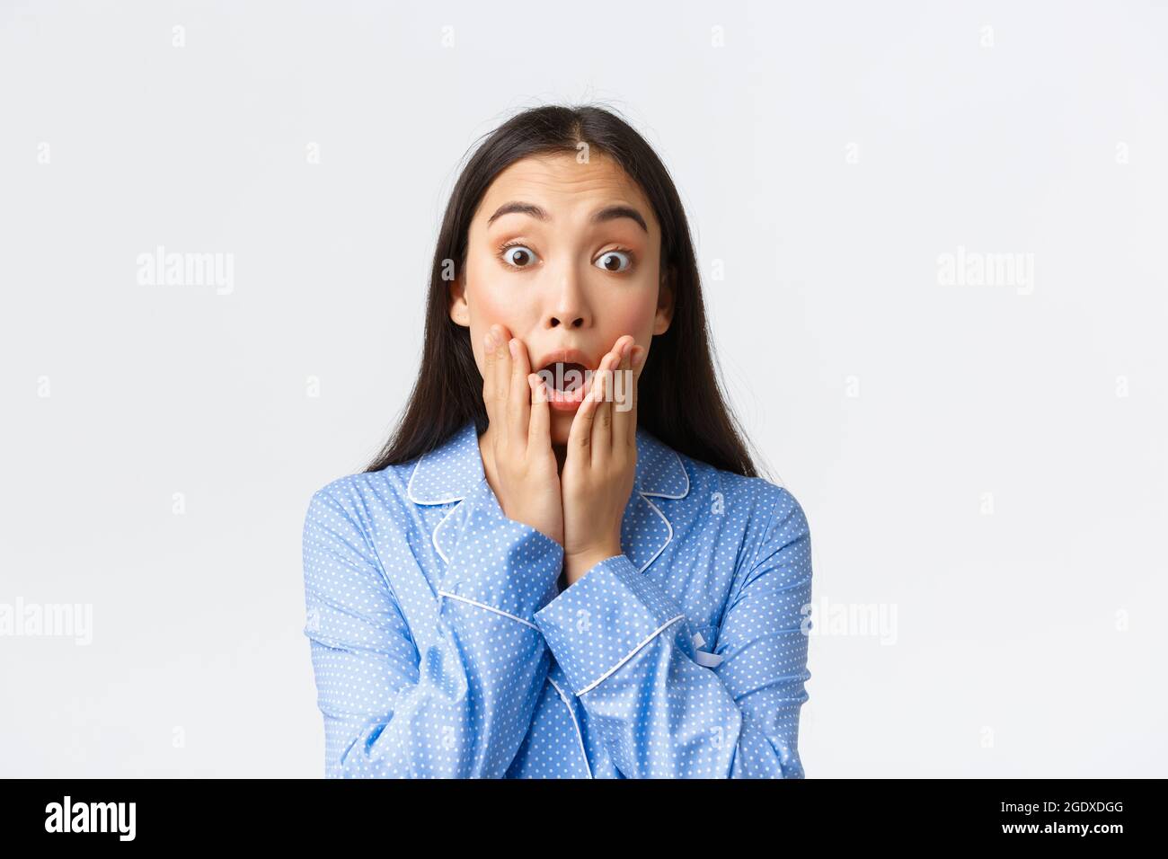 Close-up shot of amazed and impressed, excited pretty asian girl ...