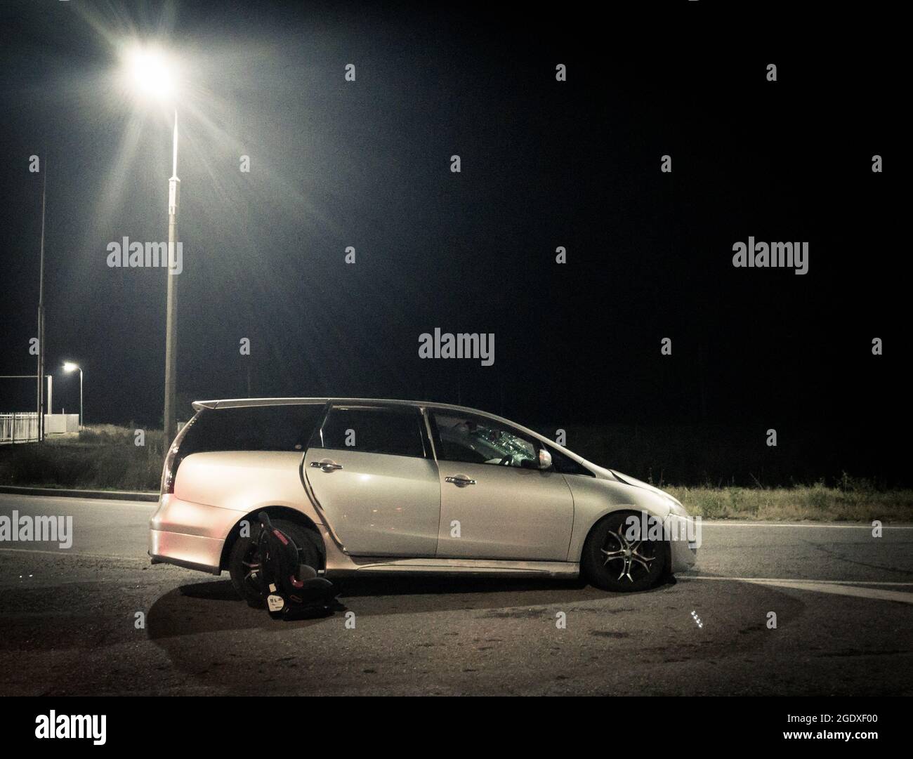 night road accident with the compact van Stock Photo - Alamy